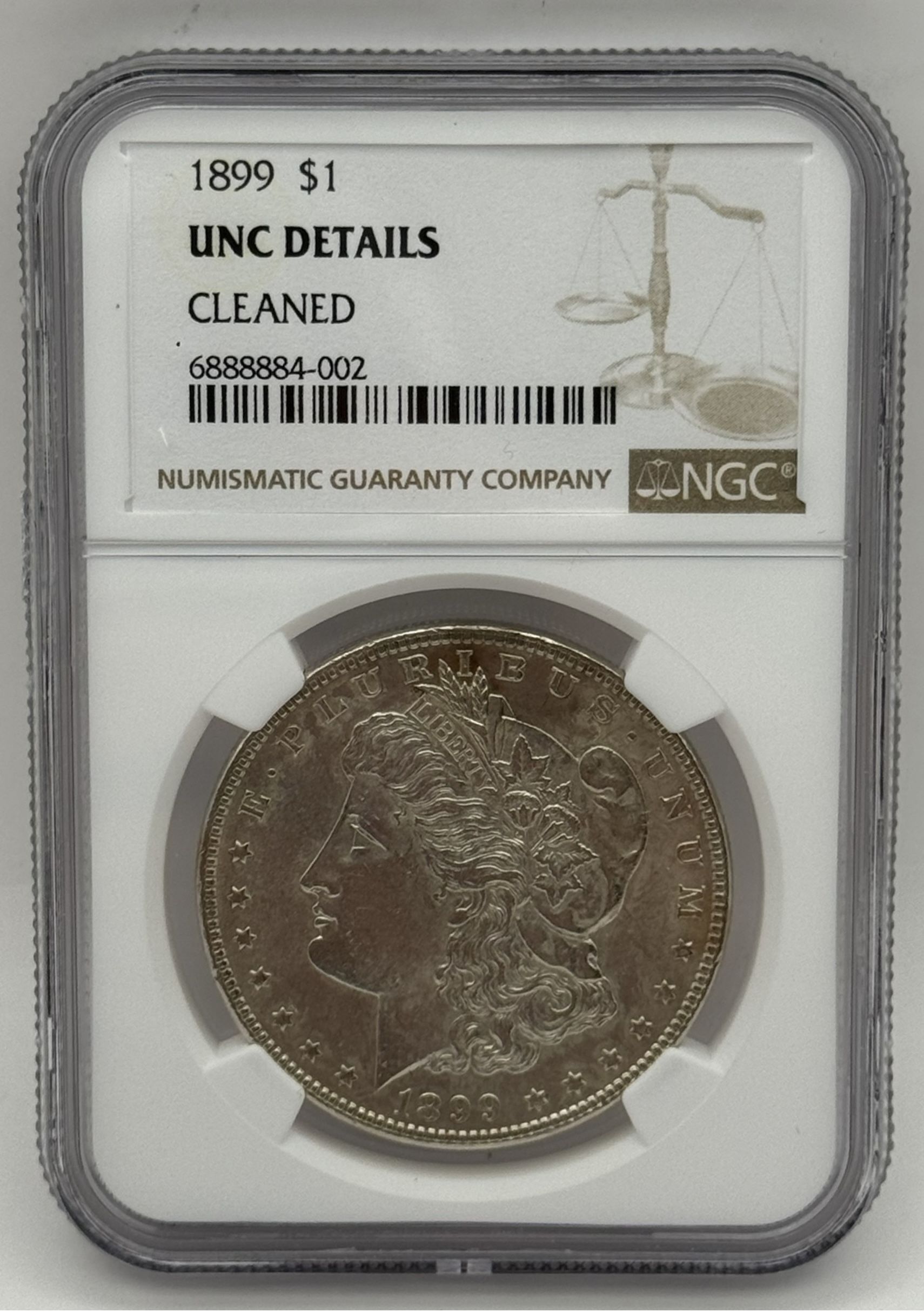 1899 $ Morgan Dollar NGC UNC DETAILS Cleaned